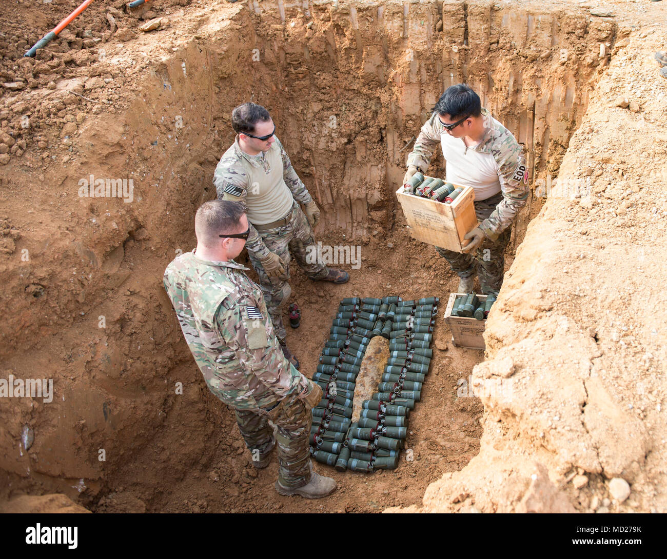 Explosive ordnance disposal team members from the 18th Civil Engineer ...