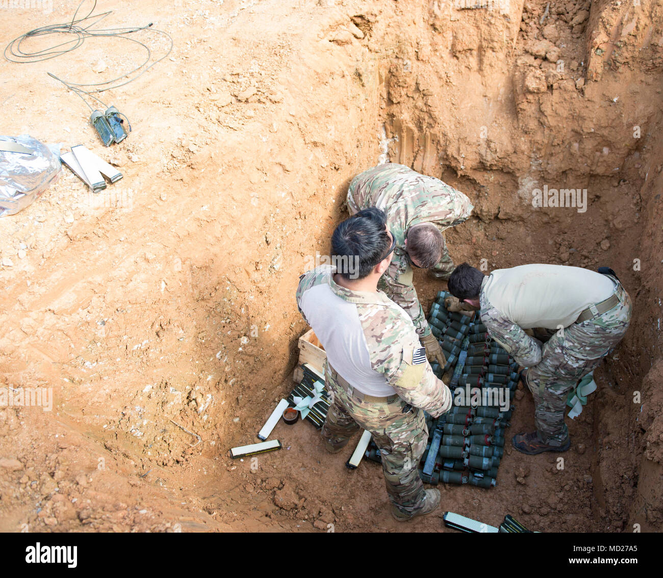 Explosive ordnance disposal team members from the 18th Civil Engineer ...