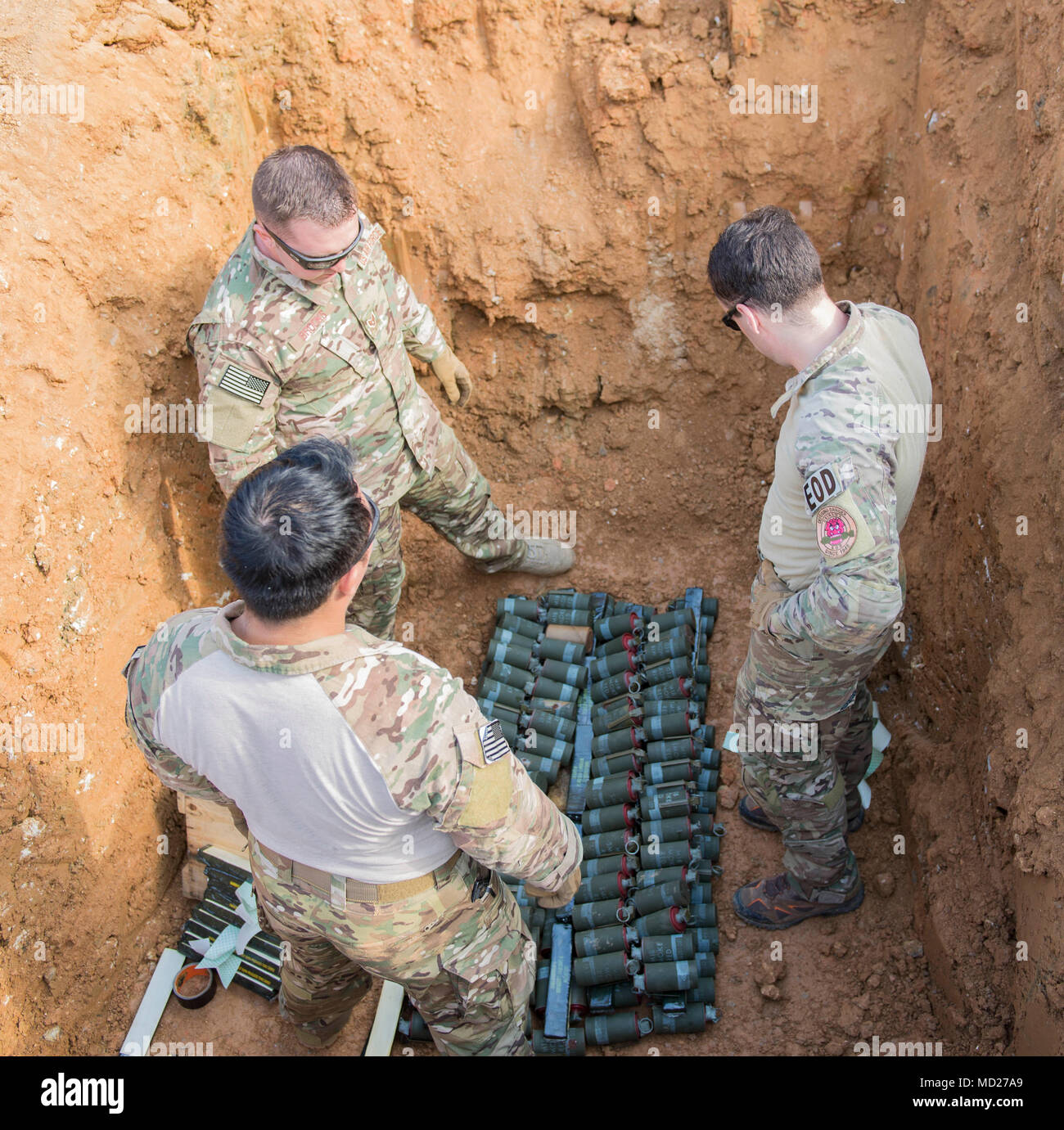 Explosive ordnance disposal team members from the 18th Civil Engineer ...