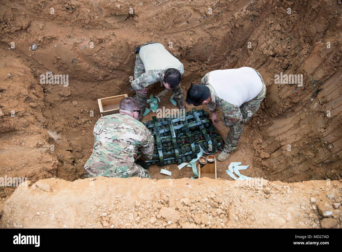 Explosive ordnance disposal team members from the 18th Civil Engineer ...