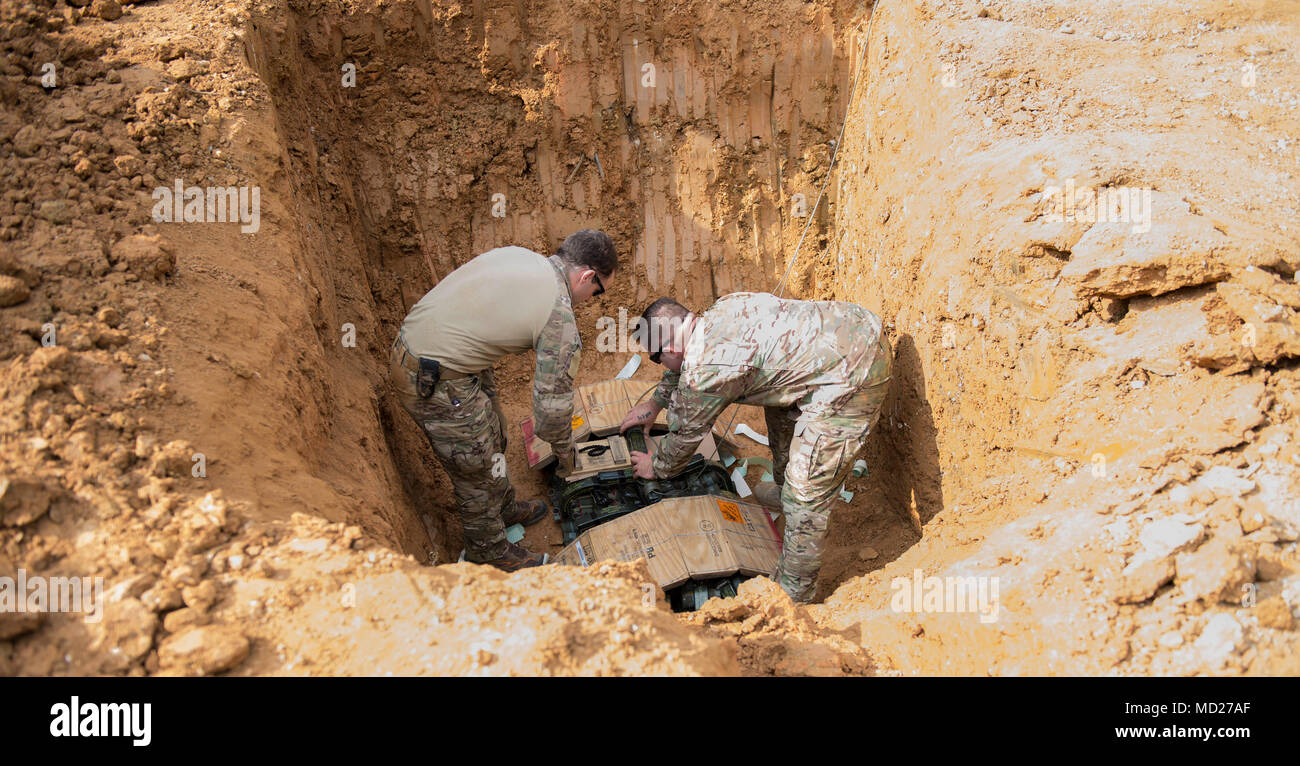 Explosive ordnance disposal team members from the 18th Civil Engineer ...