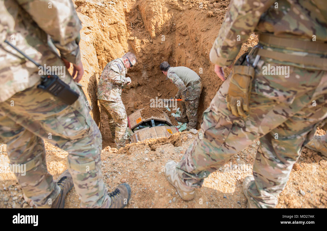 Explosive ordnance disposal team members from the 18th Civil Engineer ...