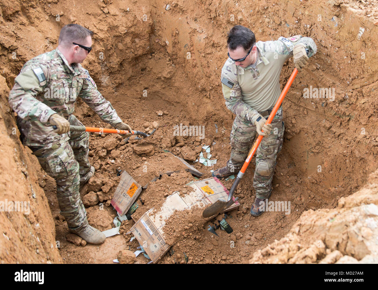 Explosive ordnance disposal team members from the 18th Civil Engineer ...
