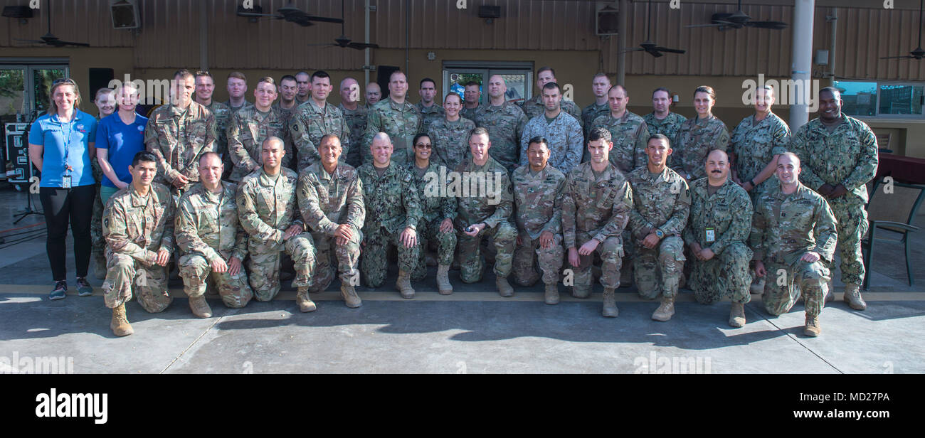 U.S. service members deployed to Camp Lemonnier, Djibouti, pose for a ...
