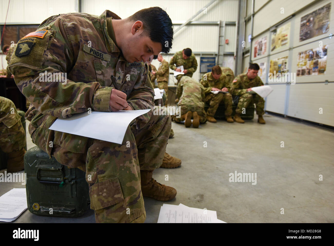 U.S. Army Sgt. Michael Pindel, assigned to 2nd Cavalry Regiment, takes ...