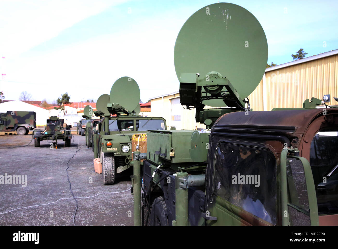 A row of Secure Mobile Anti-Jam Reliable Tactical Terminals seen during ...