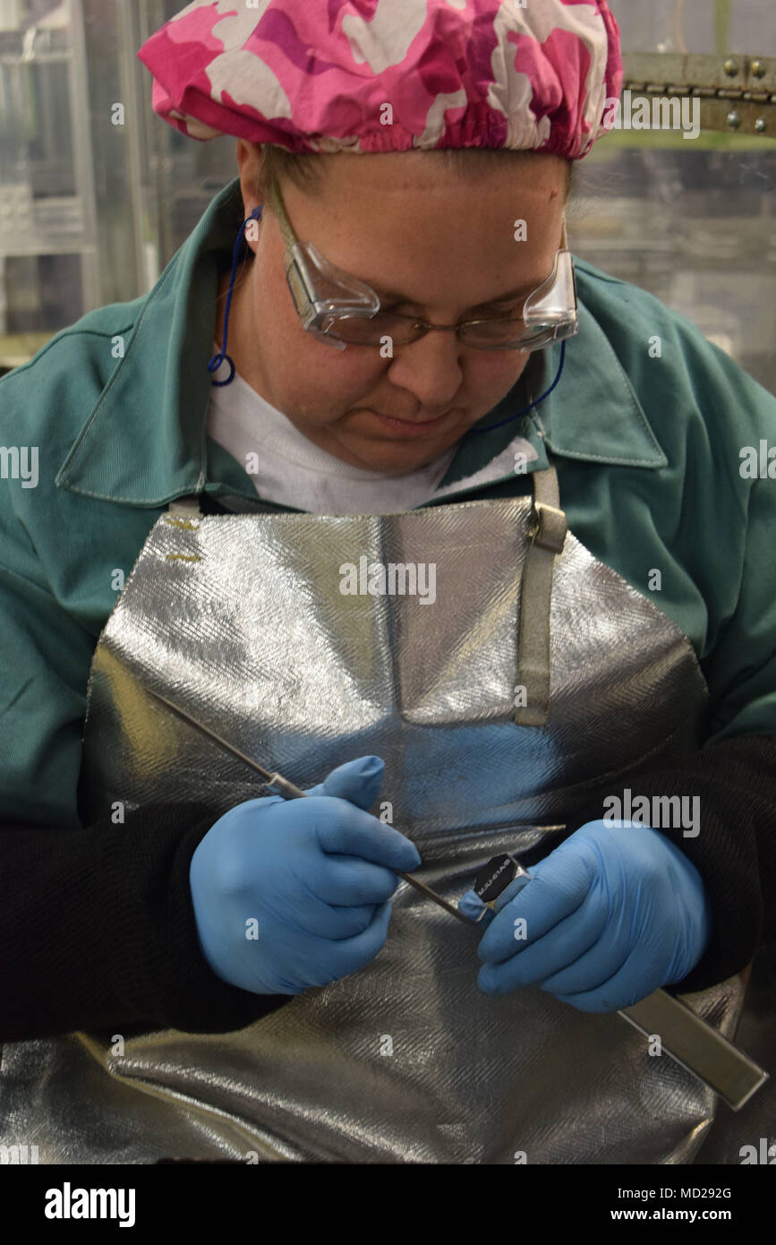 Crane Army Ammunition Activity employees produce decoy flares used on ...