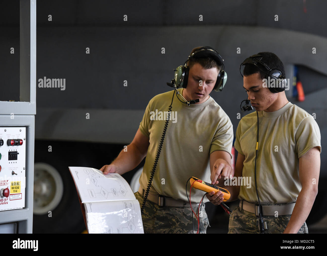 Airman Alexander Love, pointing, and Airman Joshua McAfee, 364th ...