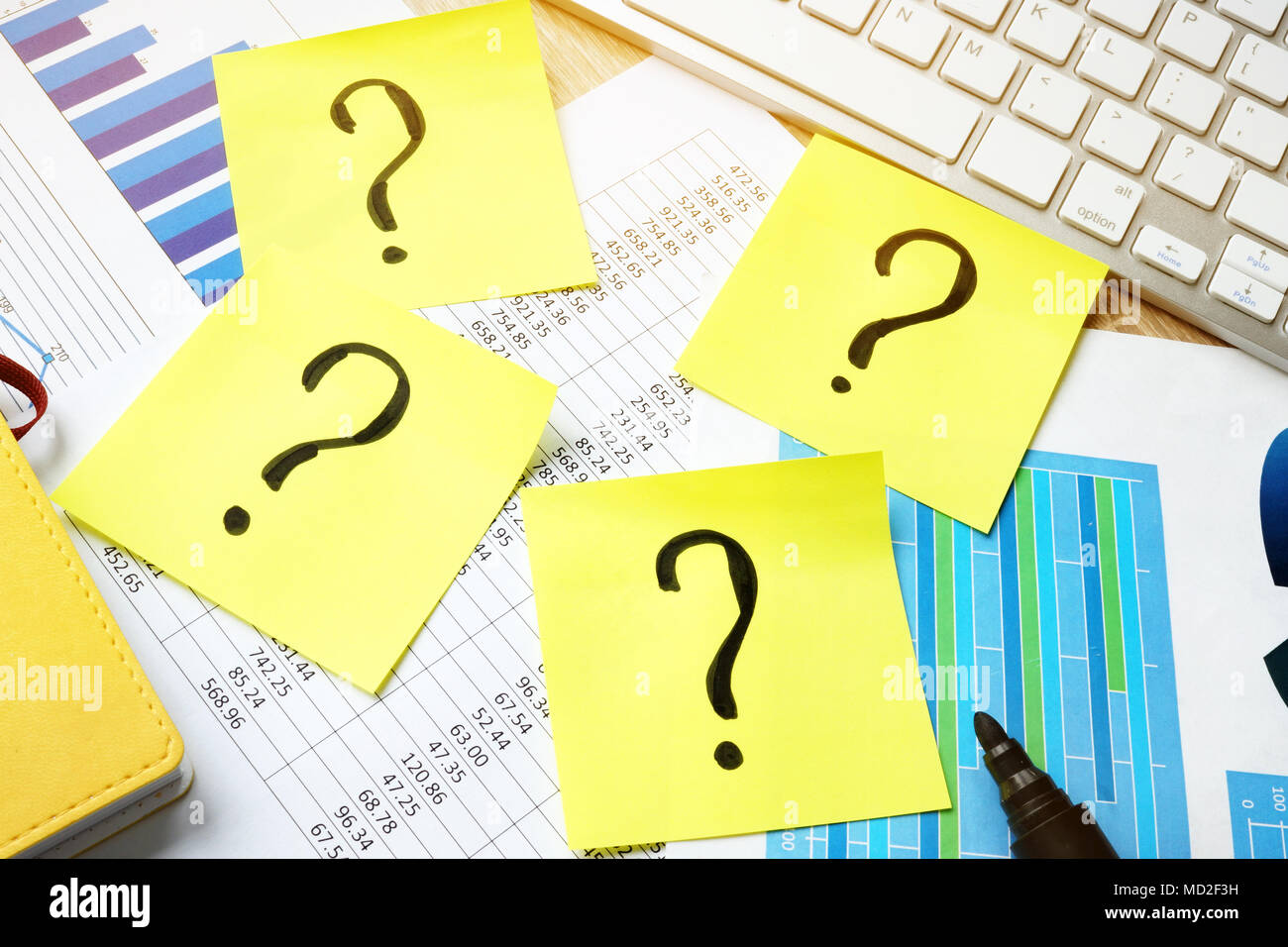 Problems in business. Question marks on sticks Stock Photo - Alamy