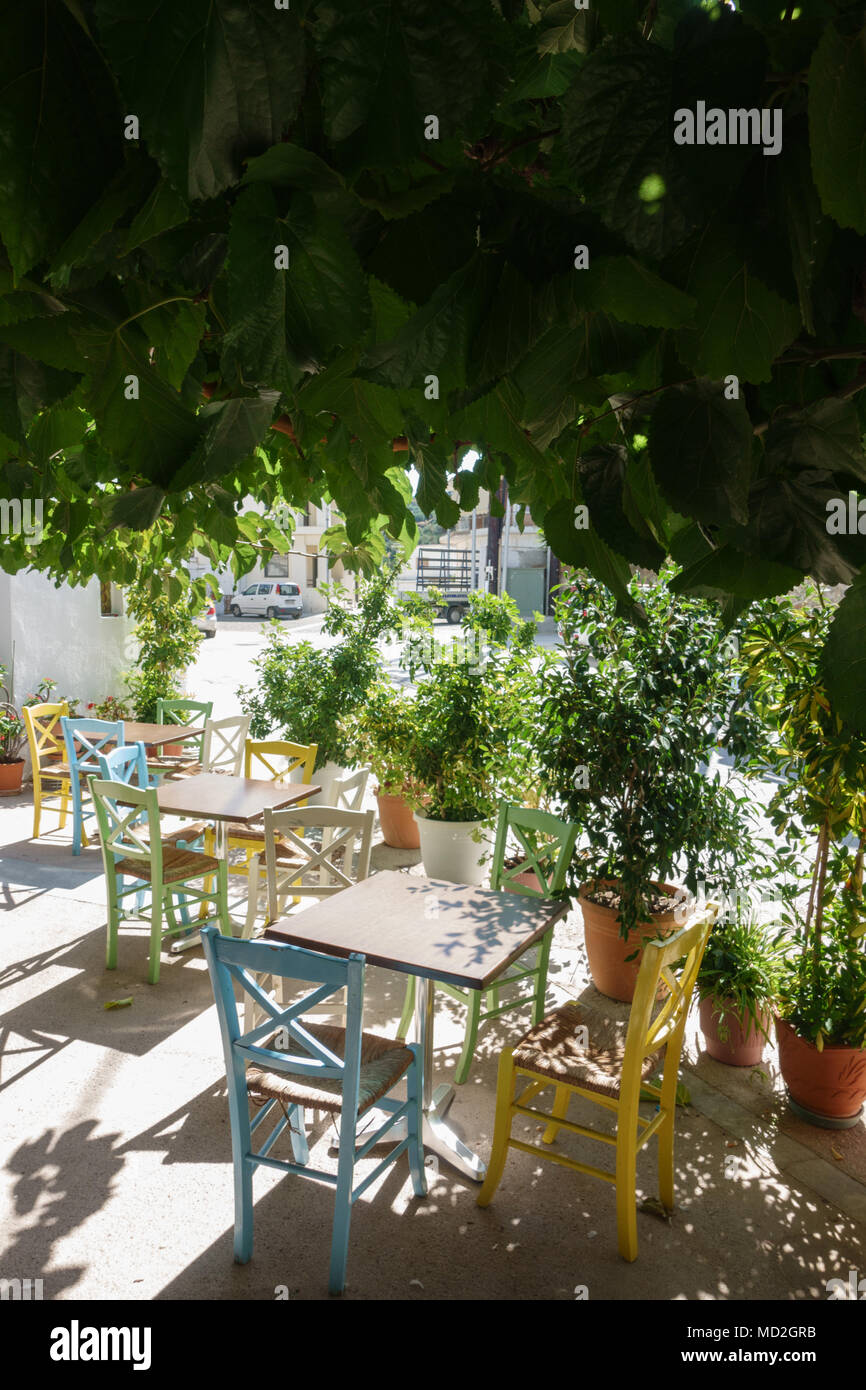 Chairs and table at outdoor cafe, Crete, Greece Stock Photo - Alamy