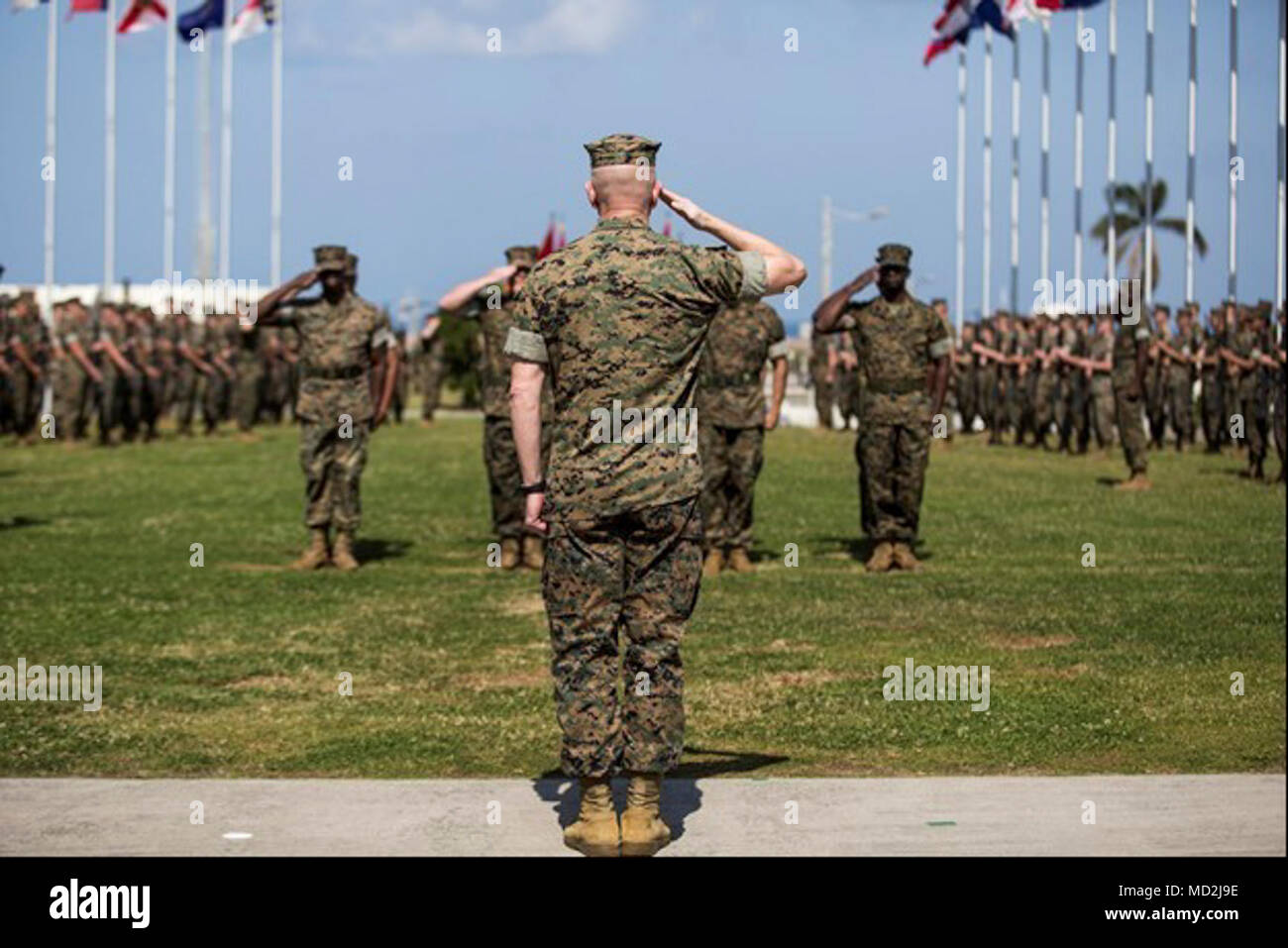 CAMP FOSTER, OKINAWA, Japan – Brig. Gen. Paul Rock Jr. salutes during ...