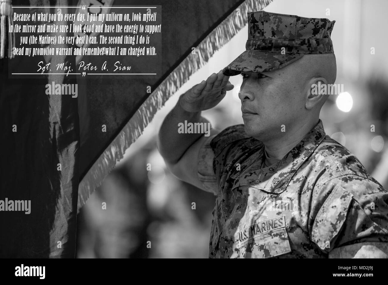 CAMP FOSTER, OKINAWA, Japan – Sgt. Maj. Peter Siaw salutes during his ...