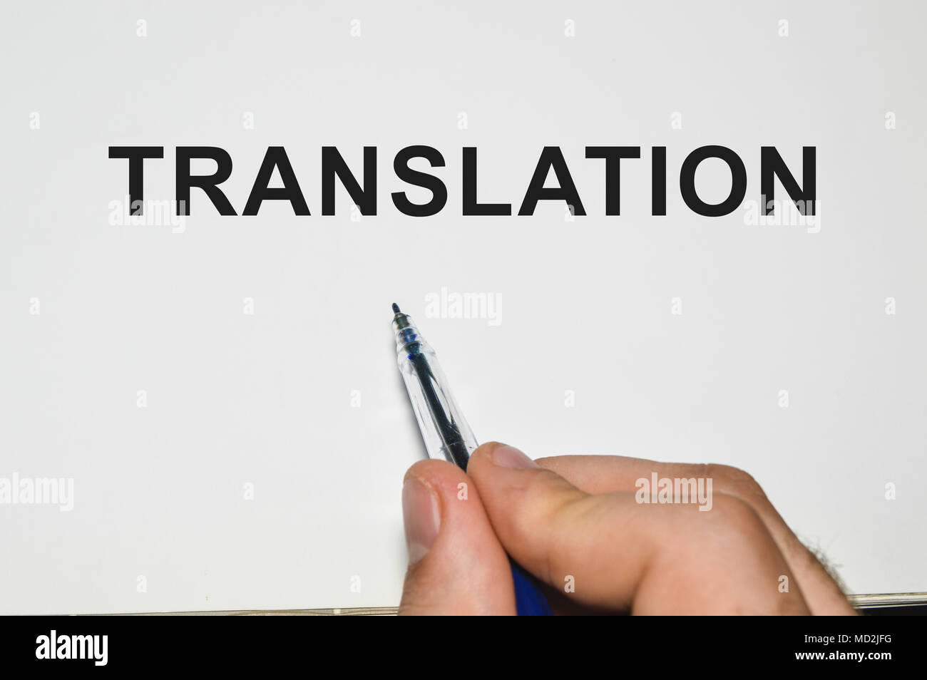 Translation word written on white paper Stock Photo - Alamy