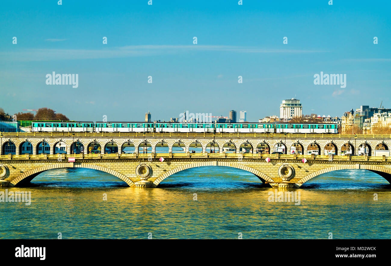 Metro train on the Pont de Bercy, a bridge over the Seine in Paris ...