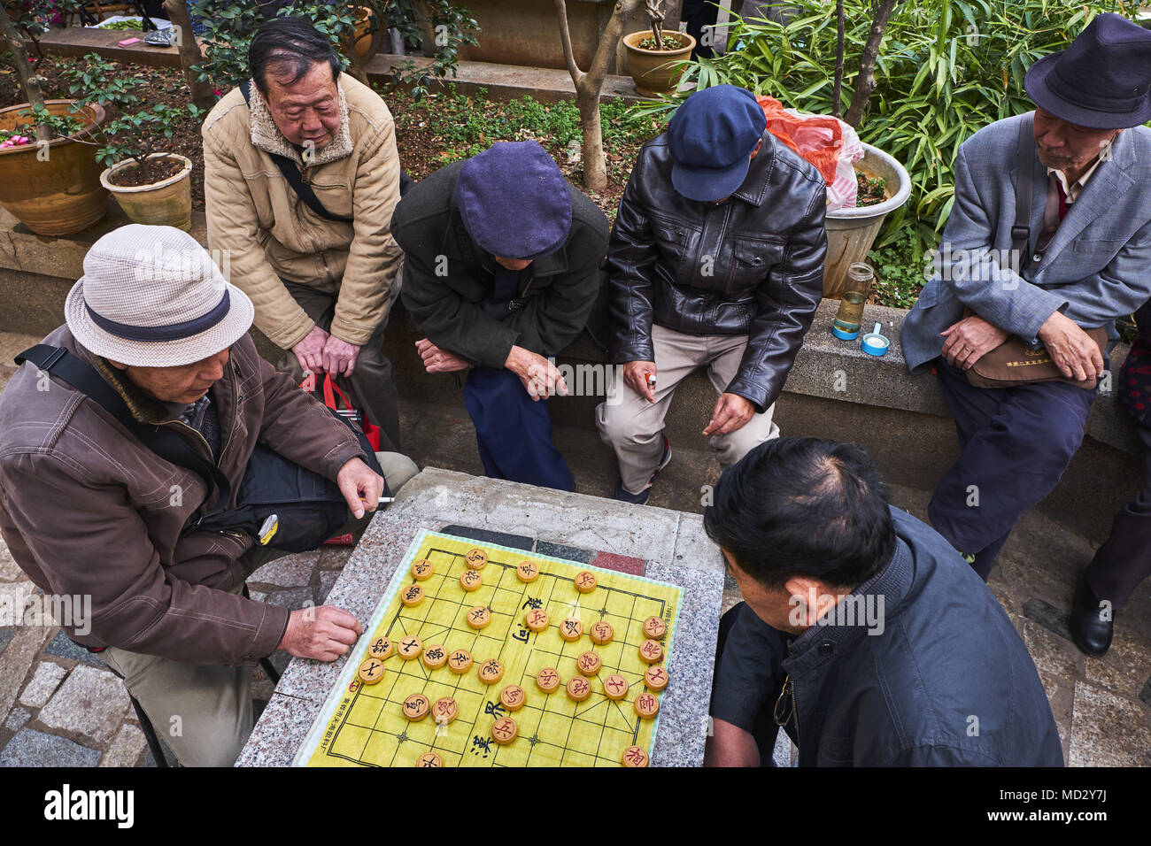 China, Yunnan, Kunming, chinese chess players and tea drinker in the ...