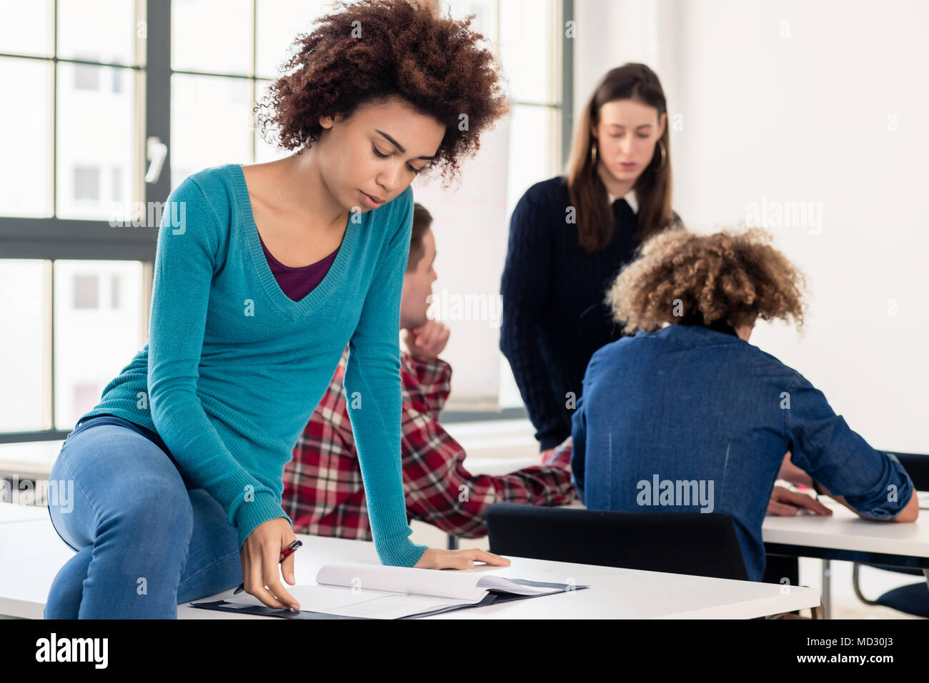 Reviewing materials hi-res stock photography and images - Alamy