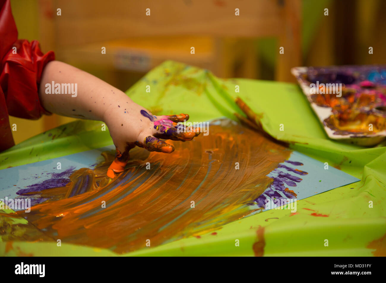 Covered in paint apron hi-res stock photography and images - Alamy