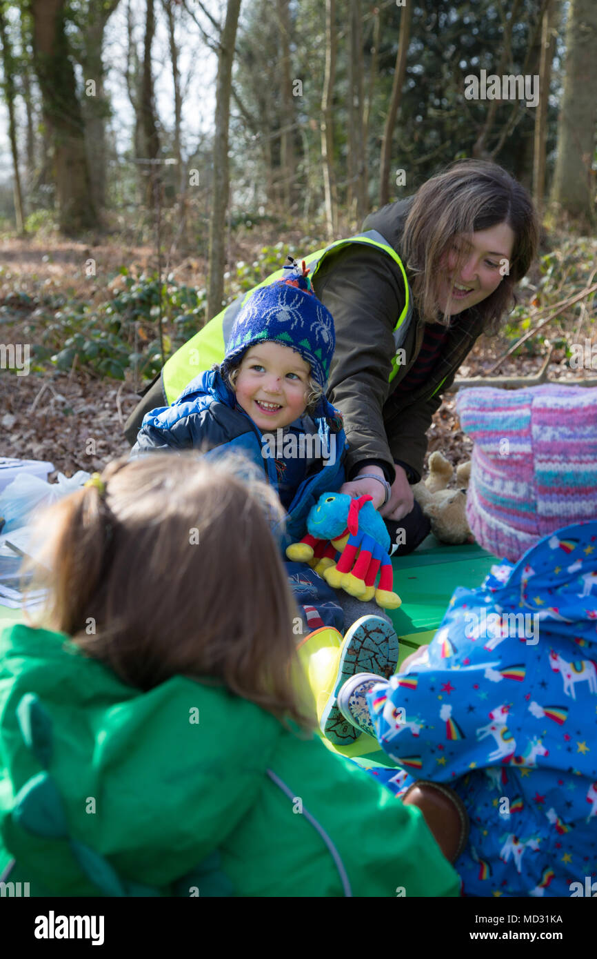 Children playing outside and wearing hats hi-res stock photography and ...
