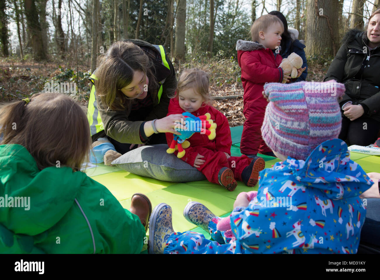 Children playing outside and wearing hats hi-res stock photography and ...