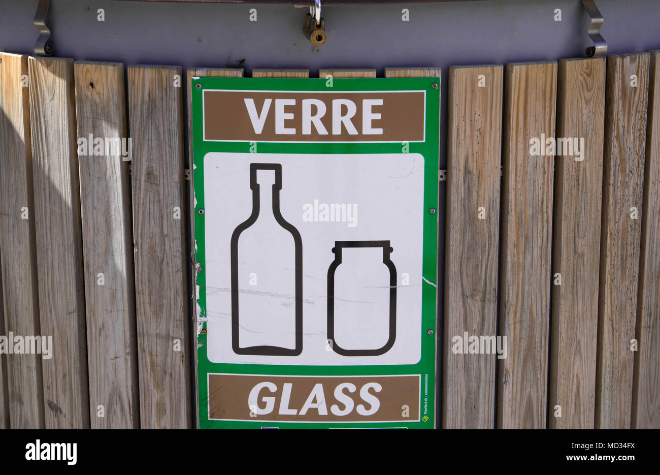 Glass bottle recycling Bin dumpster Stock Photo - Alamy