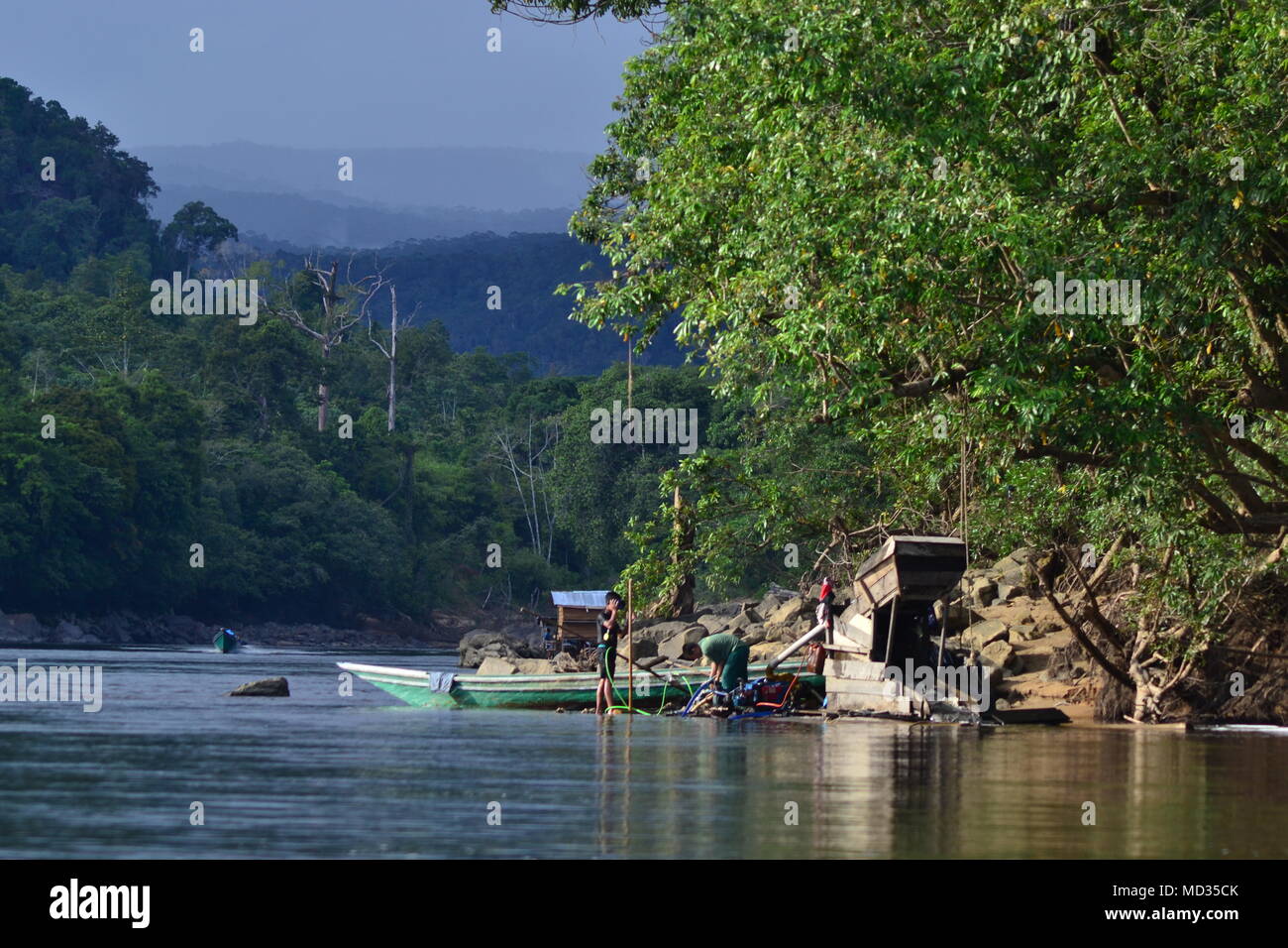 scenery of Dayak tribe and life close to the river in Borneo, Indonesia ...