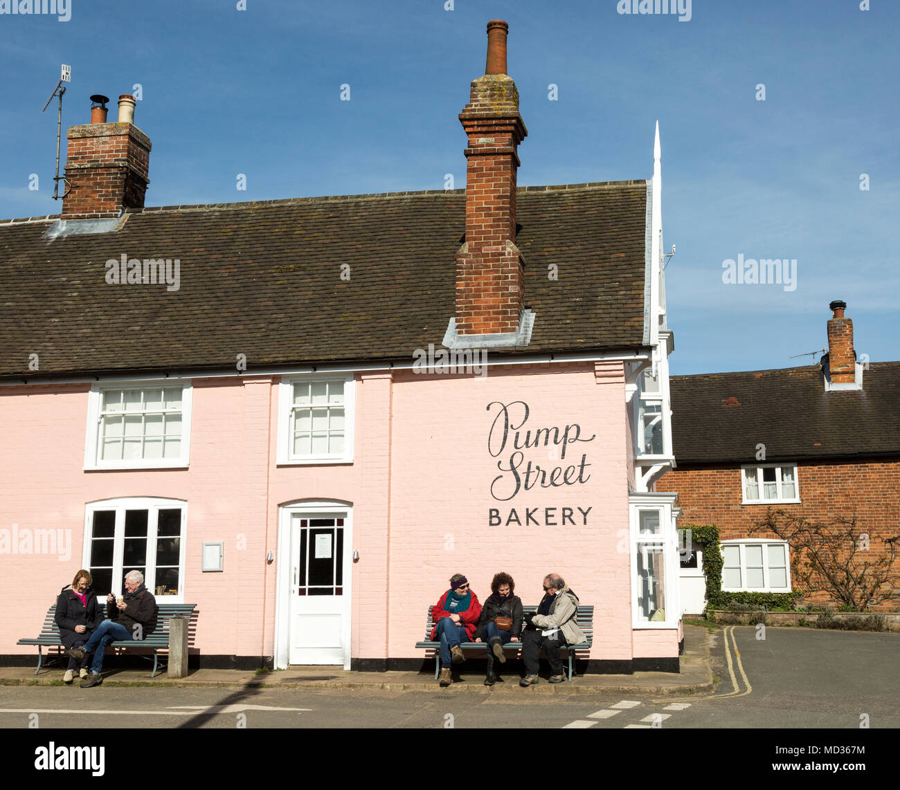 People sitting outside on sunny winter day Pump Street bakery, Orford ...