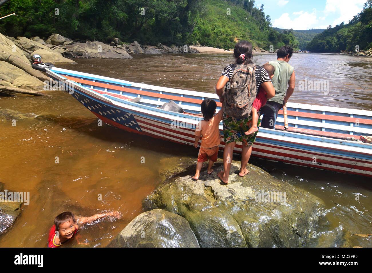 scenery of Dayak tribe and life close to the river in Borneo, Indonesia ...