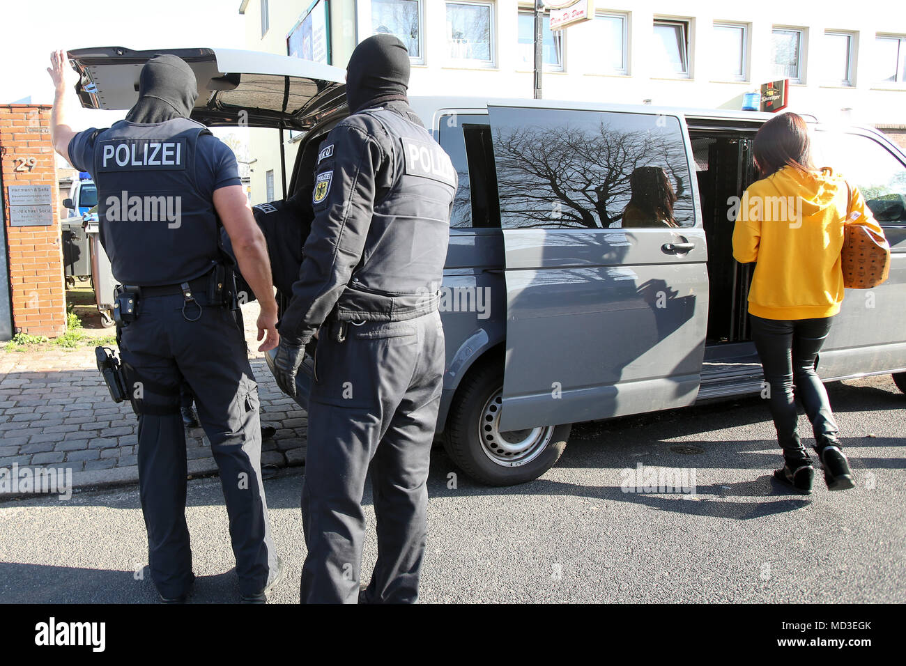 18 April 2018, Hamburg, Germany: German police forces taking one person ...