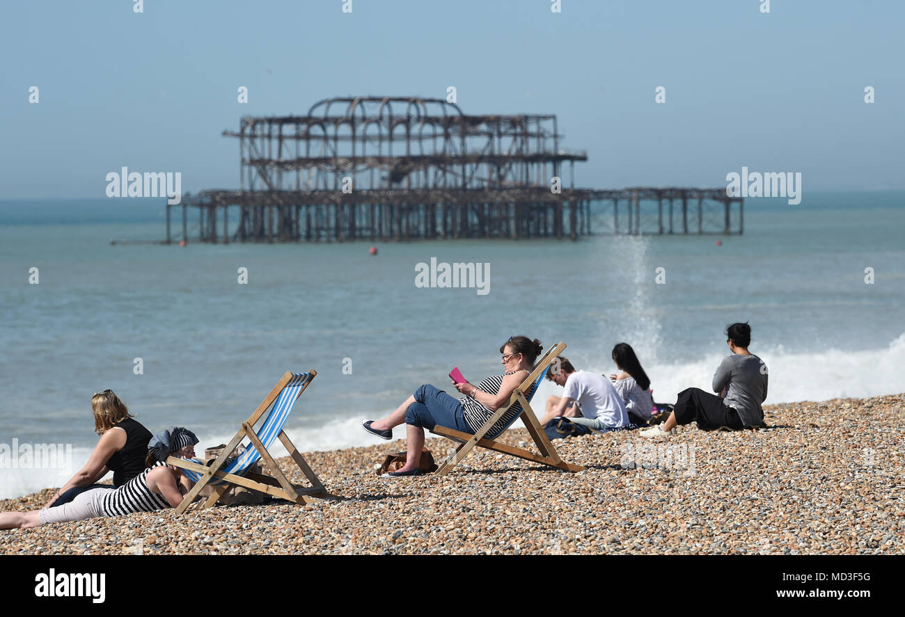 Brighton UK 18th April 2018 - Visitors enjoy the hot sunny weather on ...