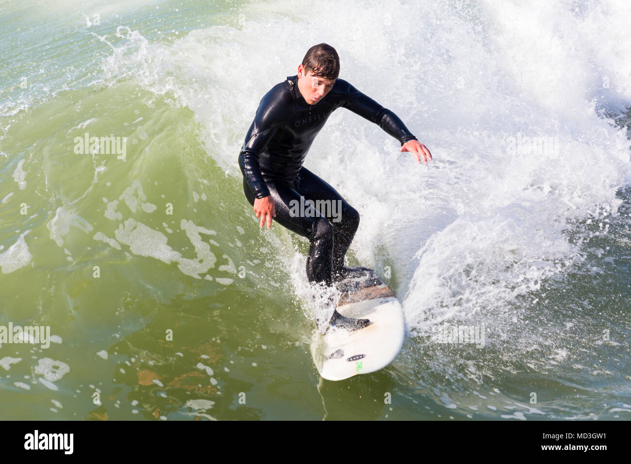 Bournemouth, Dorset, UK. 18th April 2018. UK weather: big waves provide ...