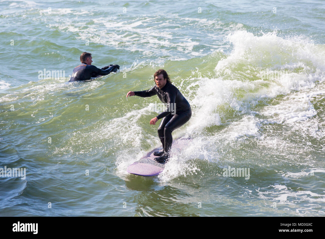Bournemouth, Dorset, UK. 18th April 2018. UK weather: big waves provide ...