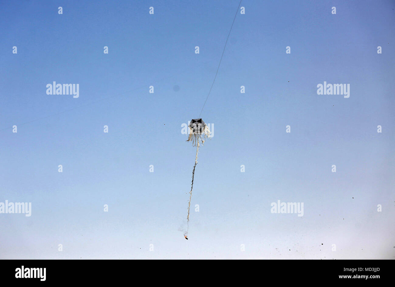 Gaza City, Gaza Strip, Palestinian Territory. 18th Apr, 2018. A kite ...