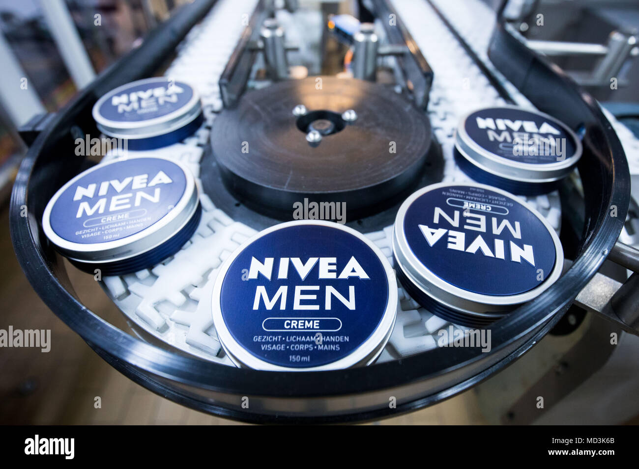 18 April 2018, Germany, Hamburg: Cans of Nivea-Creme of 'Nivea Men' are ...