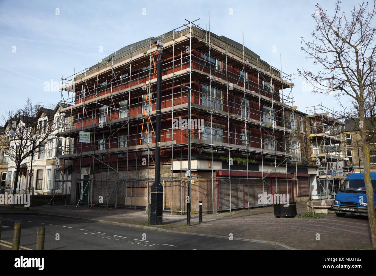 Building with scaffolding Stock Photo - Alamy