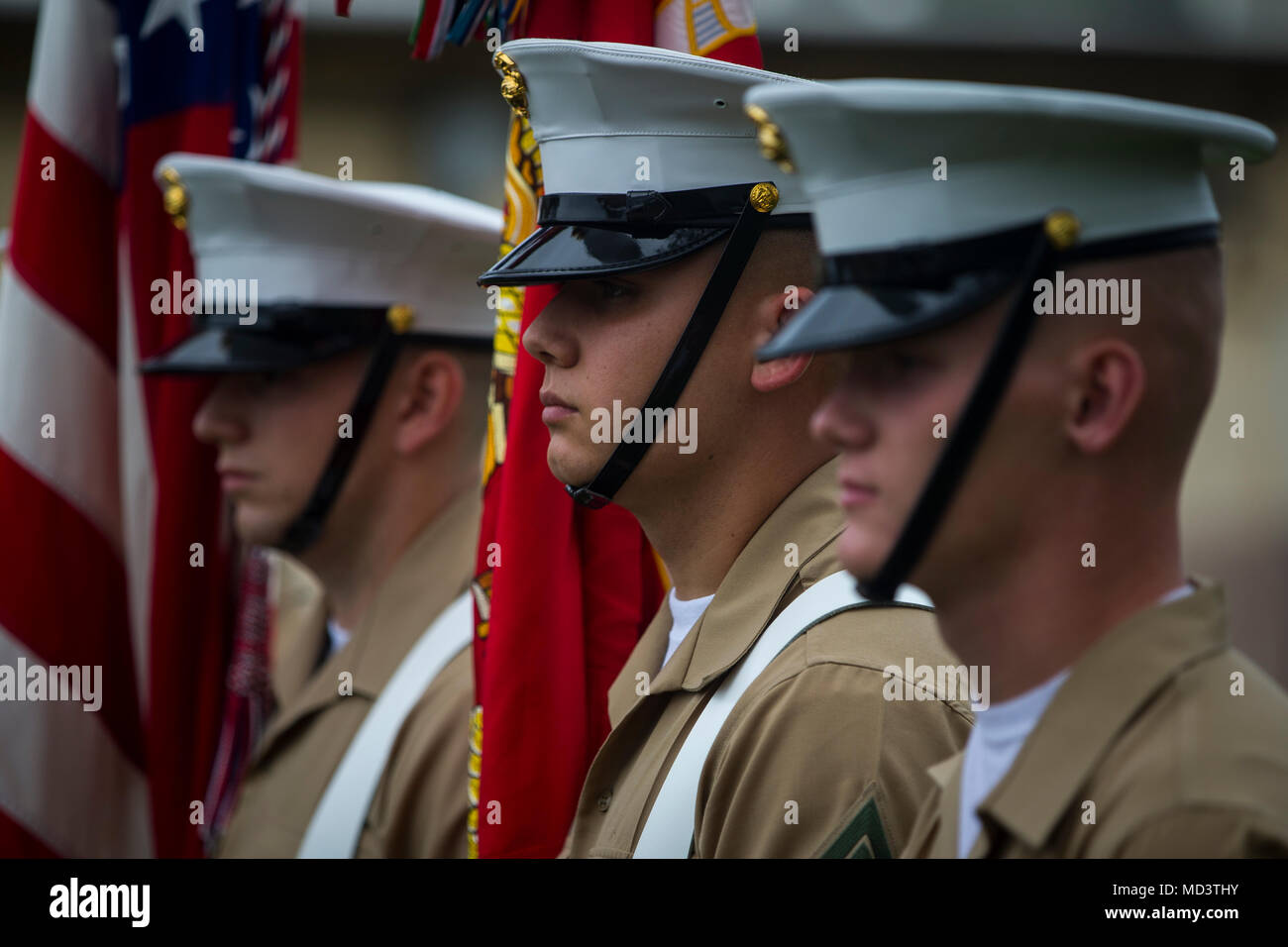 U.S. Marines with the 3rd Radio Battalion Color Guard hold the colors ...