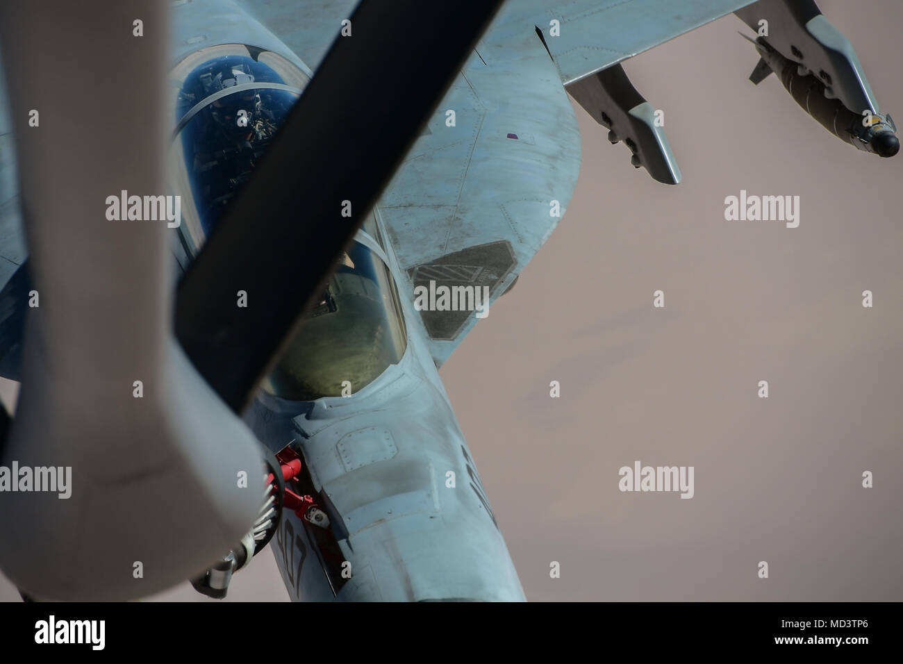 A U.S. Navy F/A-18F Super Hornet receives fuel from a KC-135 ...