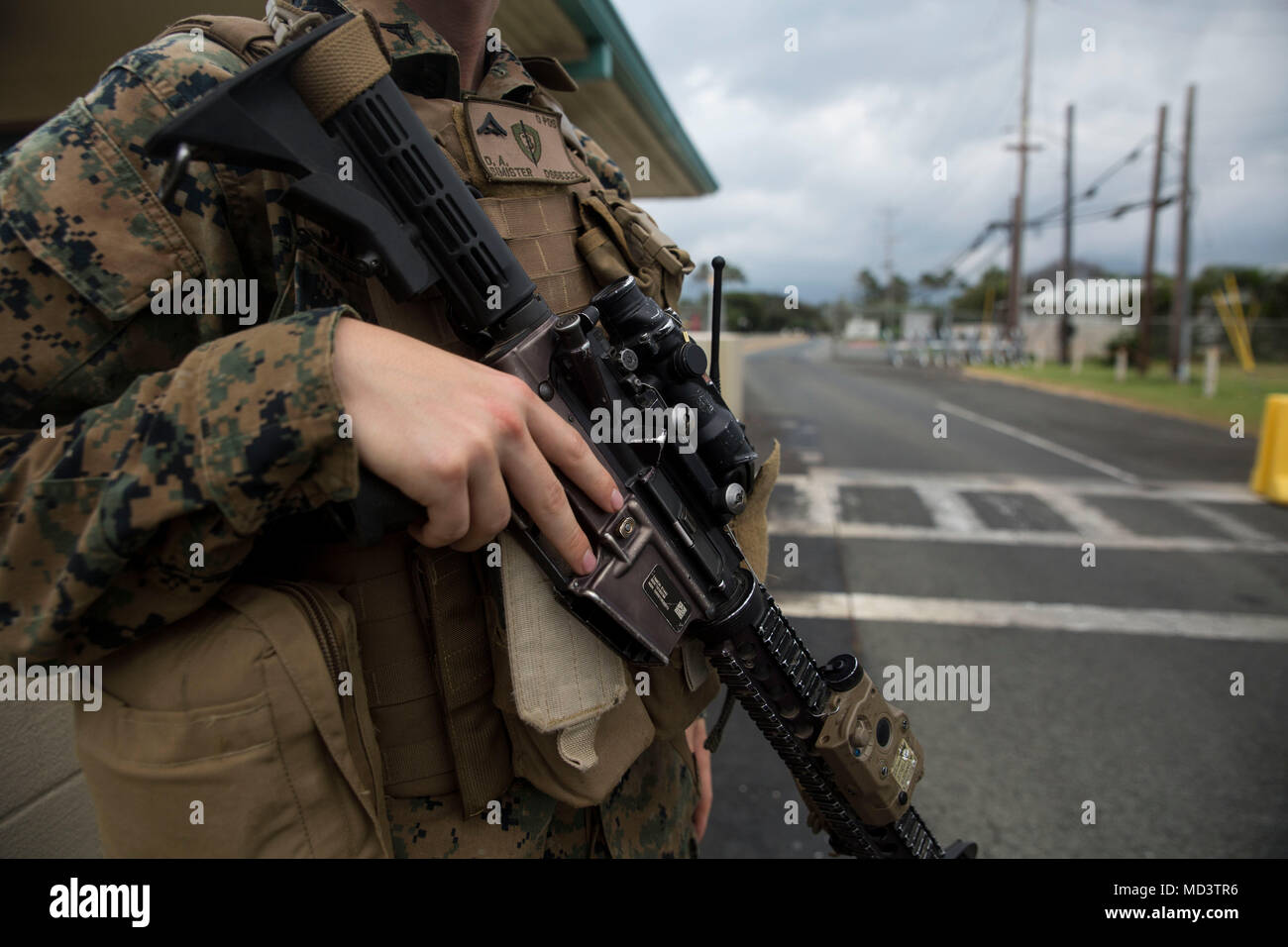 A U.S. Marine with the Security Augmentation Force provides additional ...