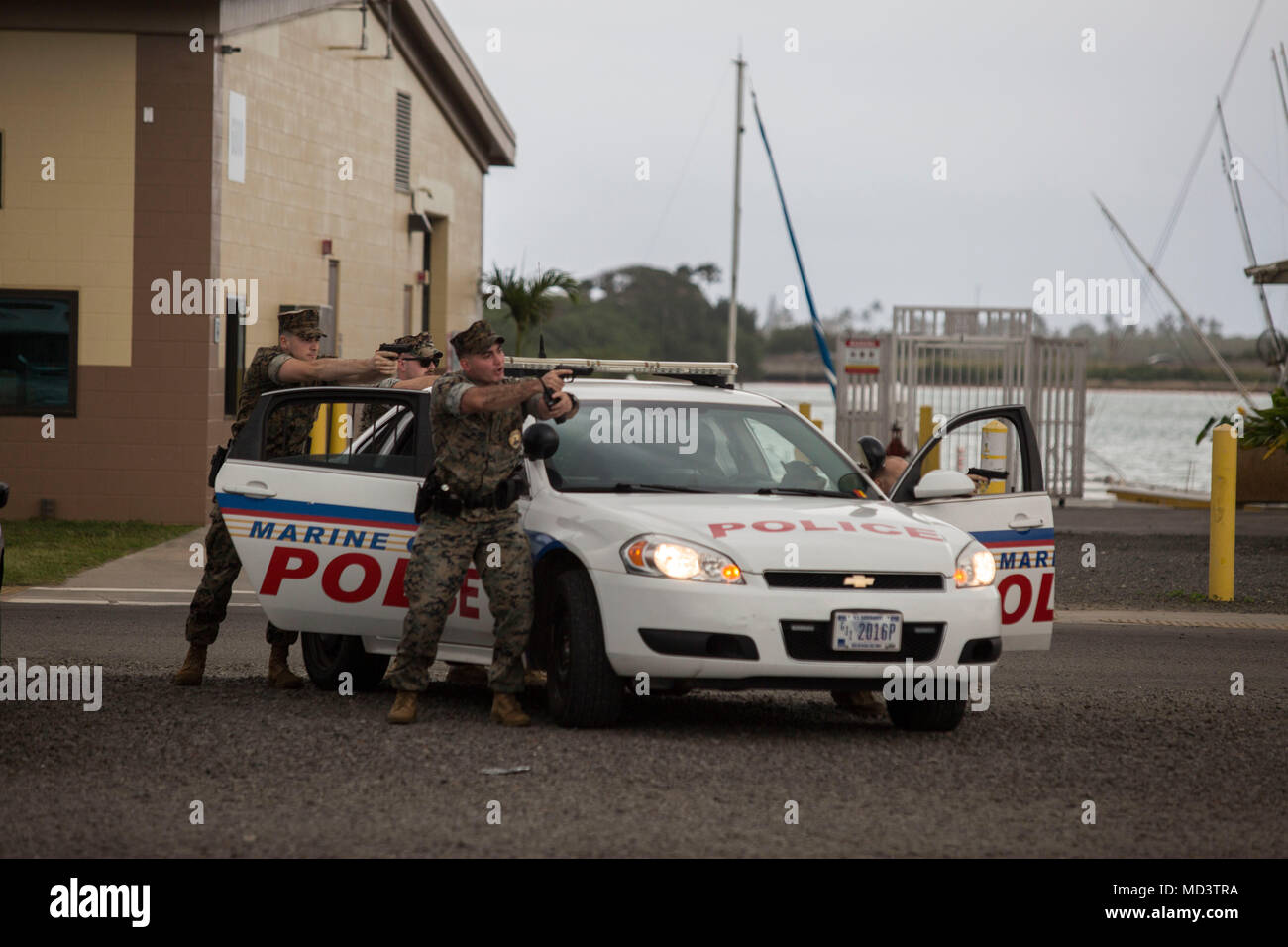U.S. Military police with the Provost Marshal’s Office draw their ...
