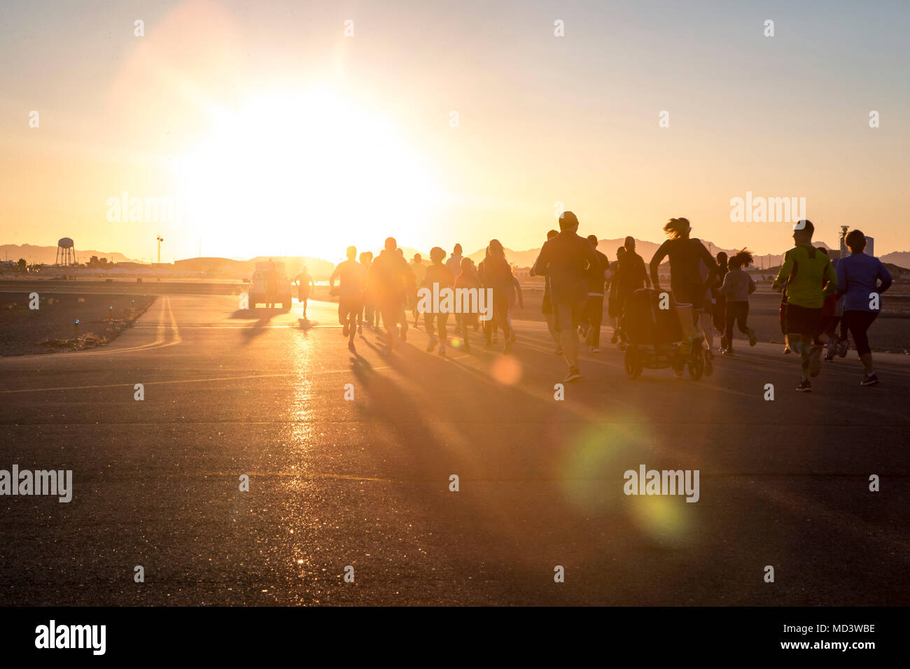 U.S. Marines and civilians participate in a 5k race on Marine Corps Air ...