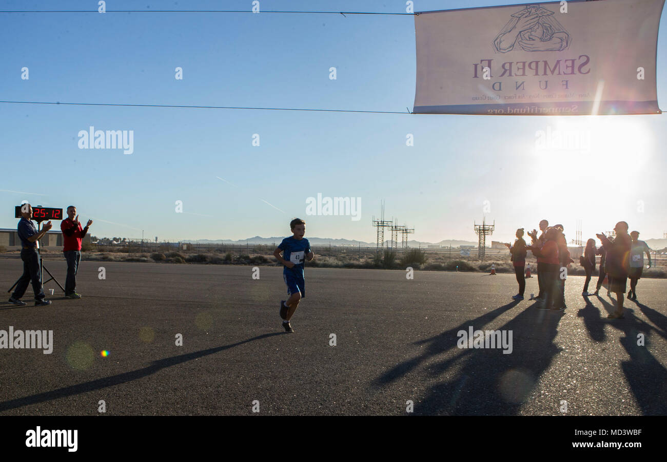 U.S. Marines and civilians participate in a 5k race on Marine Corps Air ...