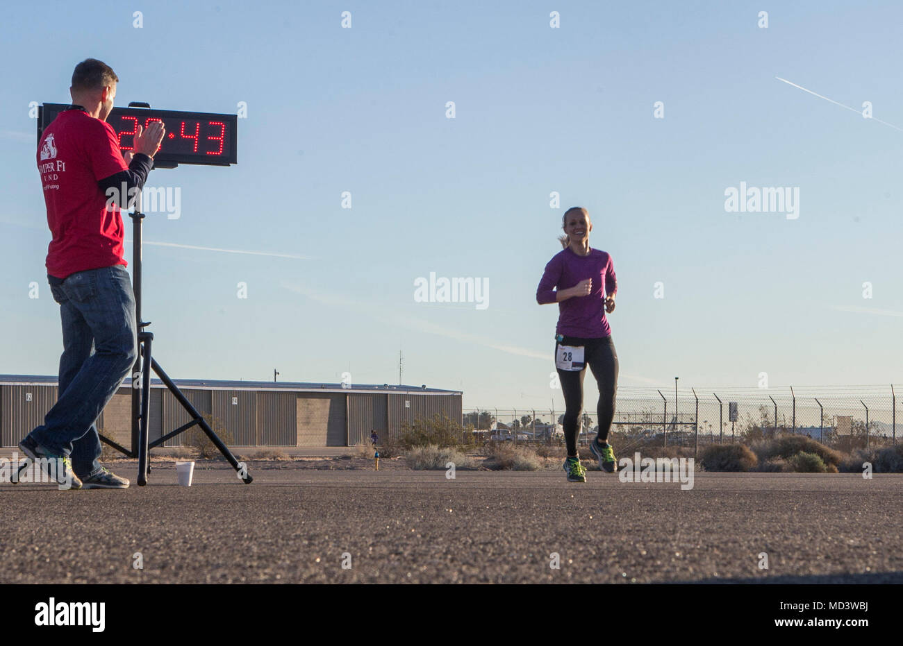 U.S. Marines and civilians participate in a 5k race on Marine Corps Air ...