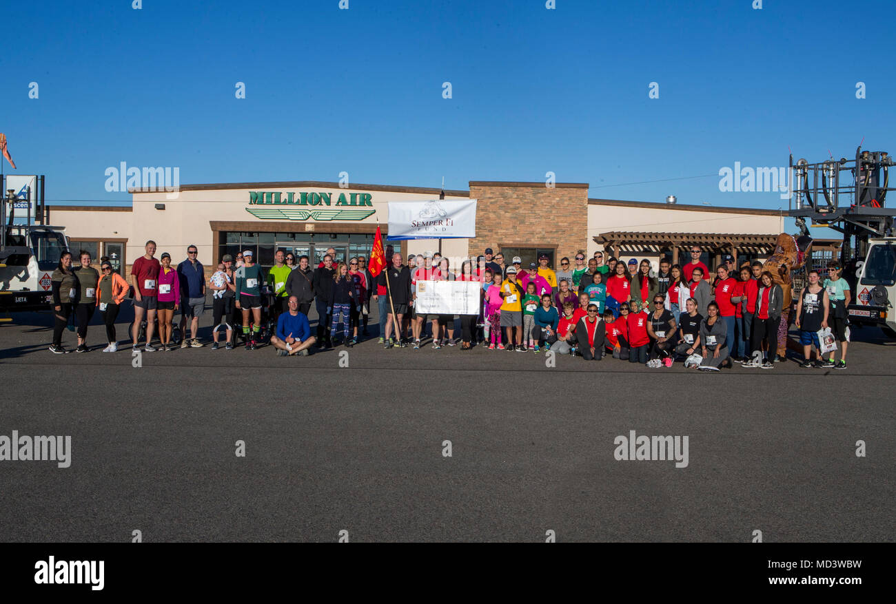 U.S. Marines and civilians participate in a 5k race on Marine Corps Air ...