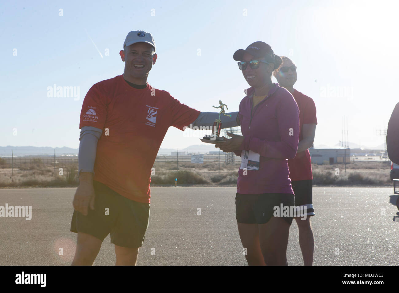 U.S. Marines and civilians participate in a 5k race on Marine Corps Air ...