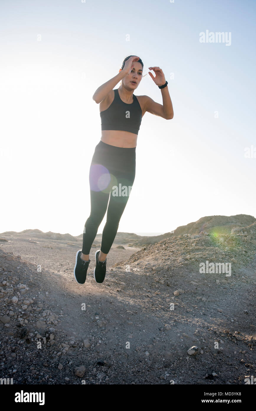 Runner in mid air hi-res stock photography and images - Alamy