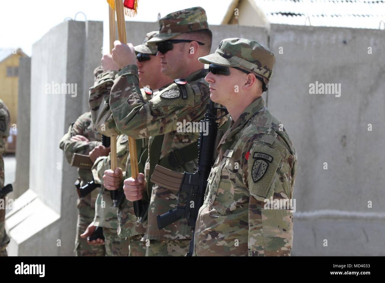 The 1st Security Force Assistance Brigade color guard stands at ...