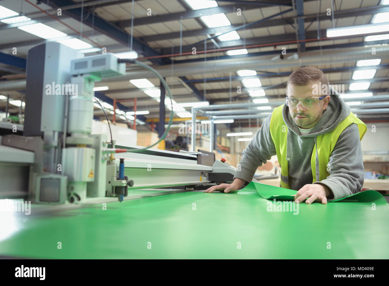 Worker operating hi-res stock photography and images - Alamy