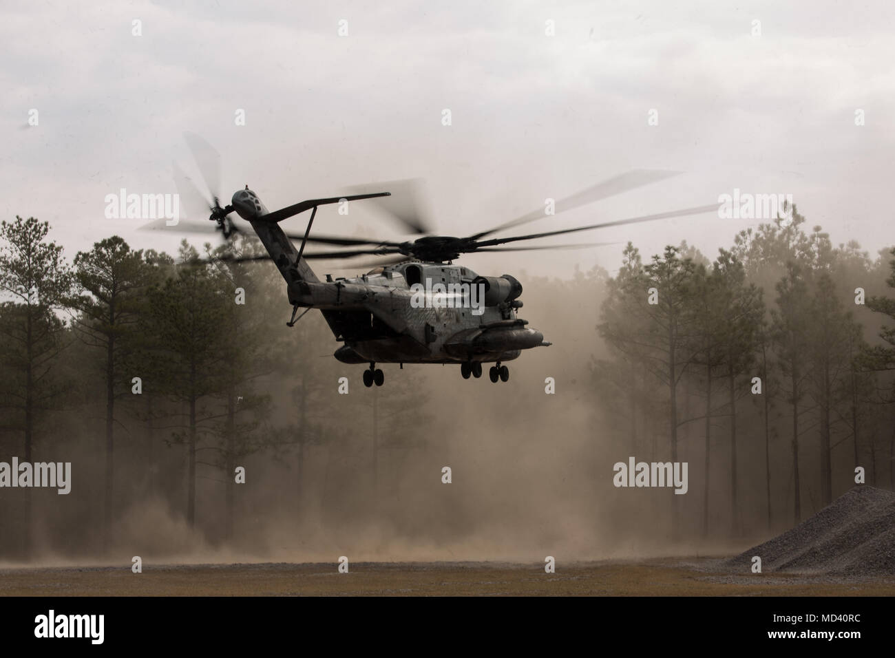 U.S Marines with HMH-464 land a CH-53 Super Sea Stallion as part of air ...