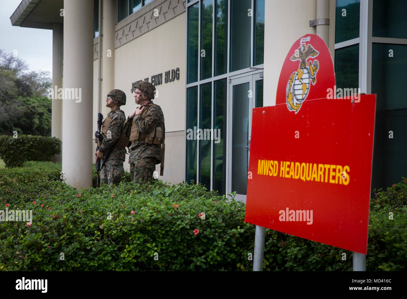 U.S. Marines with Marine Aircraft Group (MAG) 24 provide security for a ...