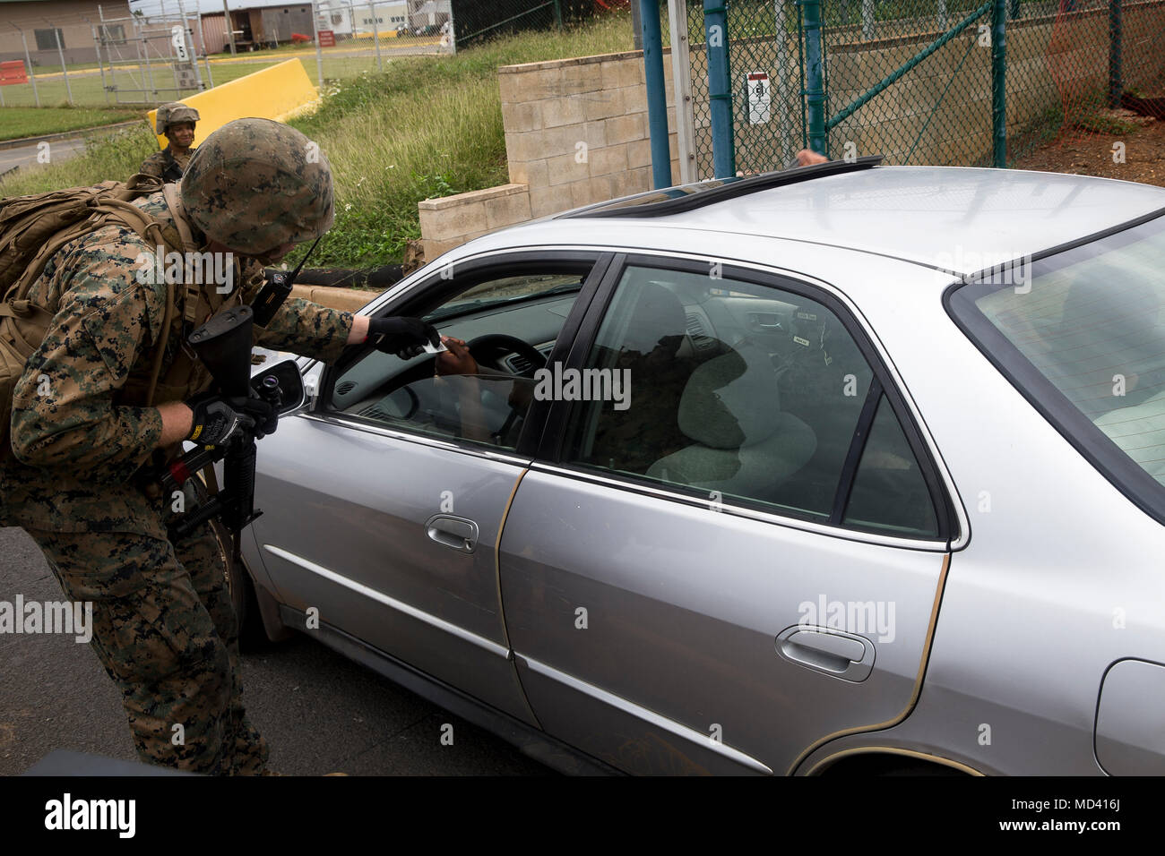 U.S. Marines with Marine Aircraft Group (MAG) 24 conduct a base defense ...