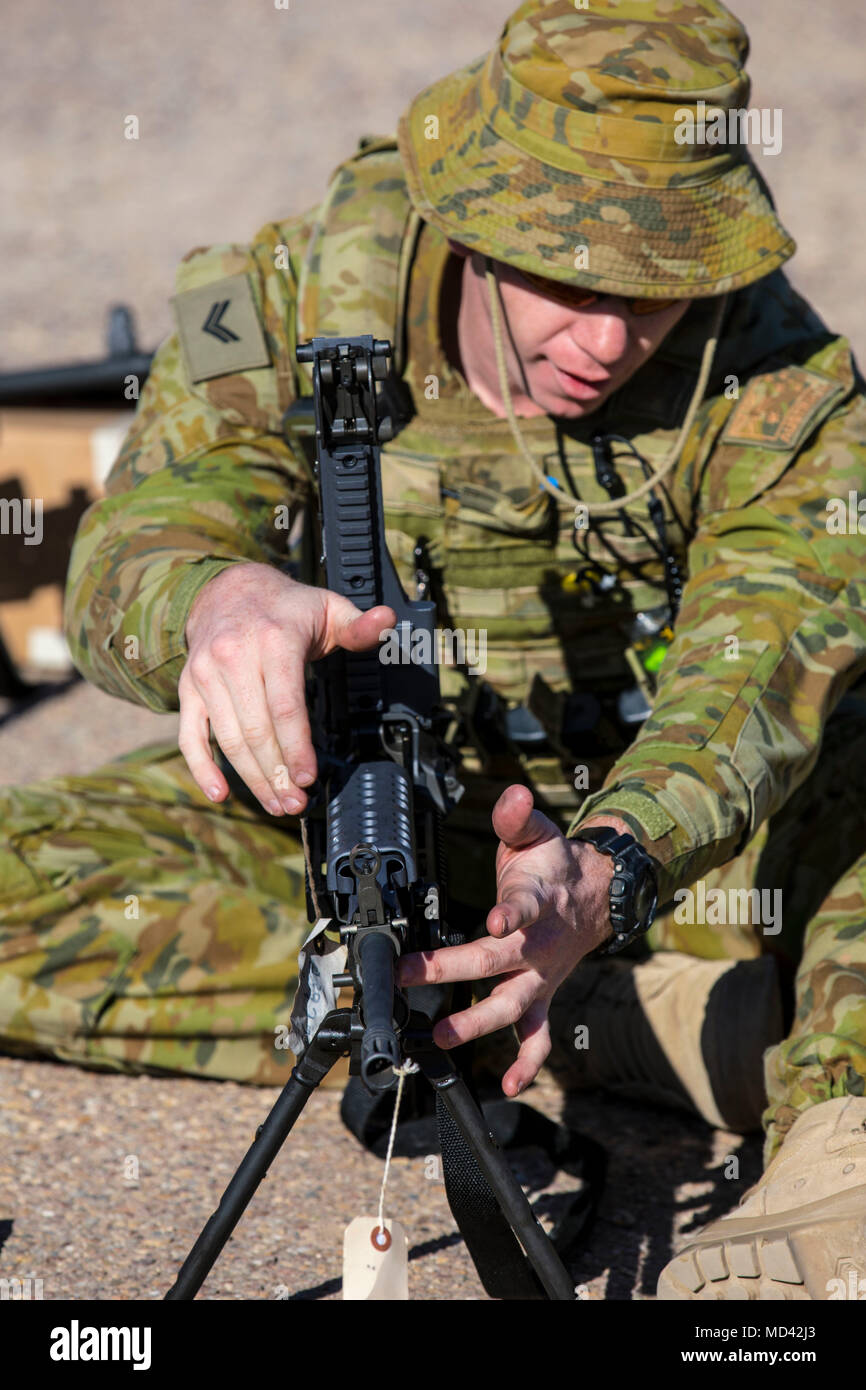 Australian army Cpl. Sean Bellert, with Task Force Taji, demonstrates ...